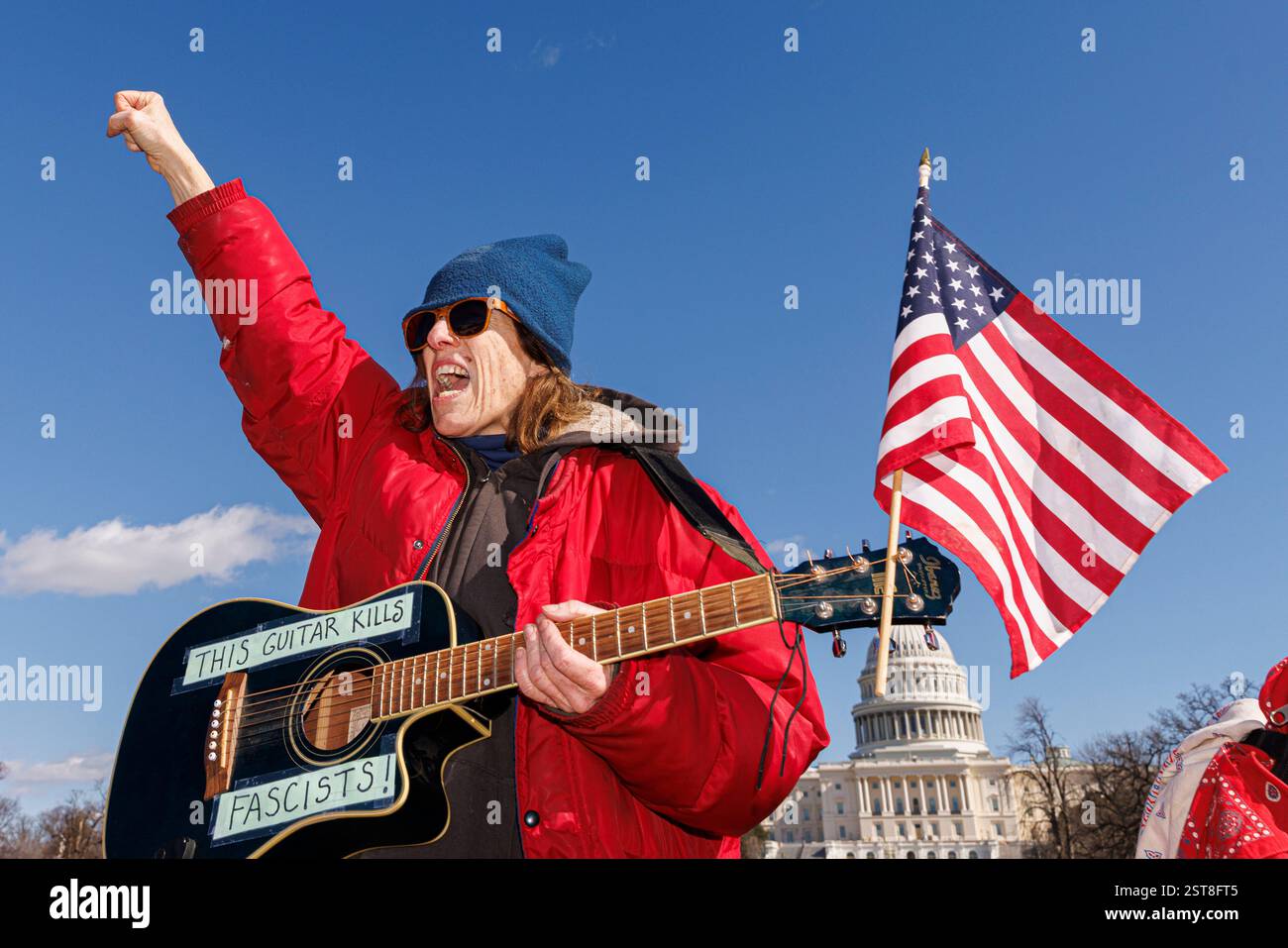 Washington, United States. 17th Feb, 2025. Protesters sing songs as ...