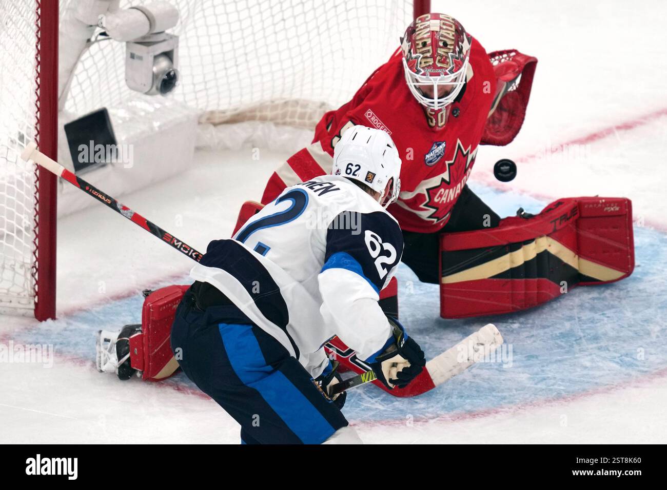 Canada goaltender Jordan Binnington makes a save on a shot by Finland's ...