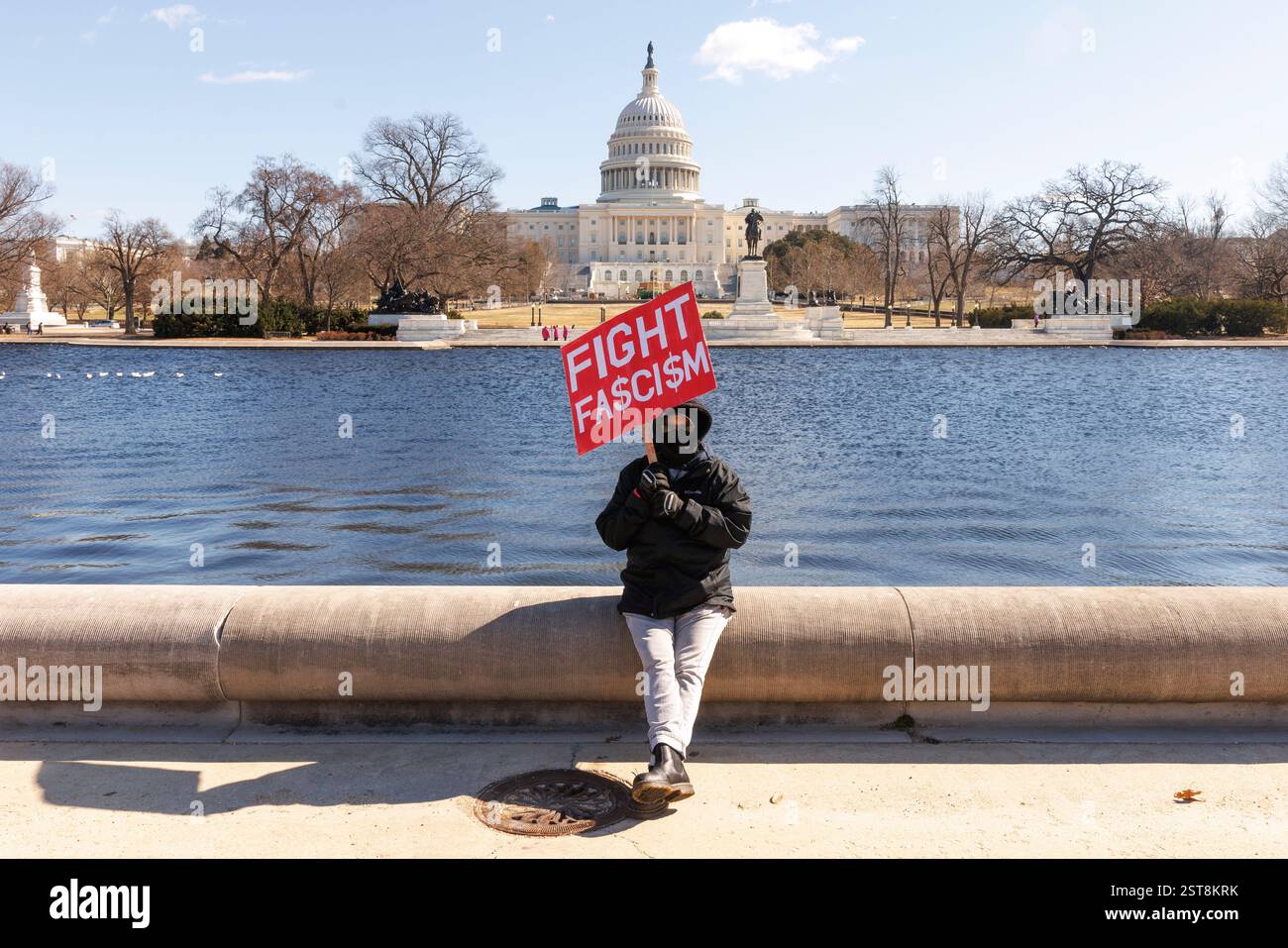 Washington, United States. 17th Feb, 2025. Protesters rally against ...