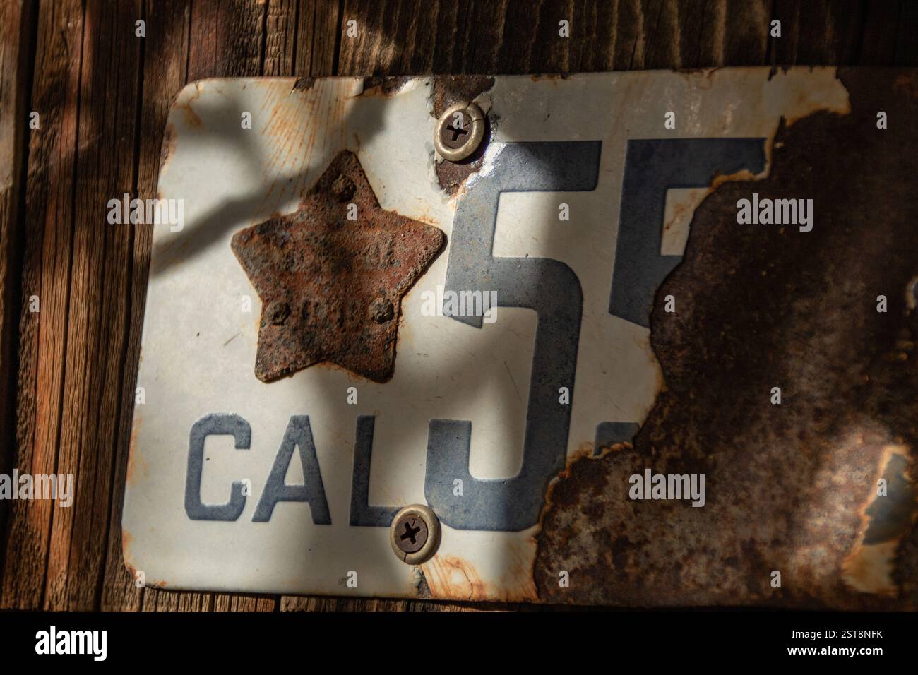 A vintage 1919 California license plate with a star validation tab in ...