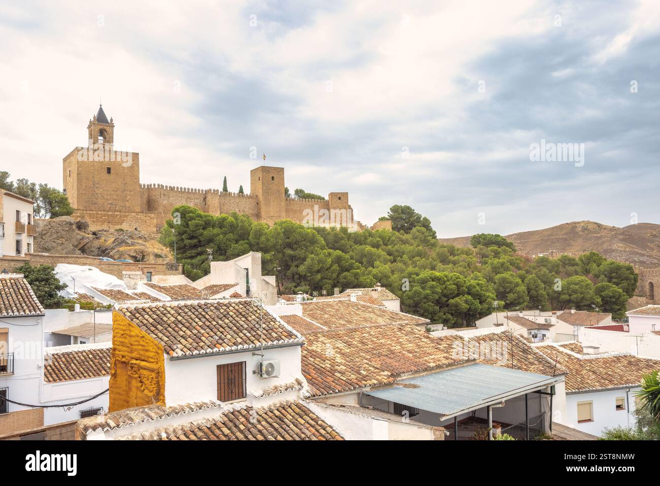 Ancient castle in Antequera town in Spain, overlooking a town with ...