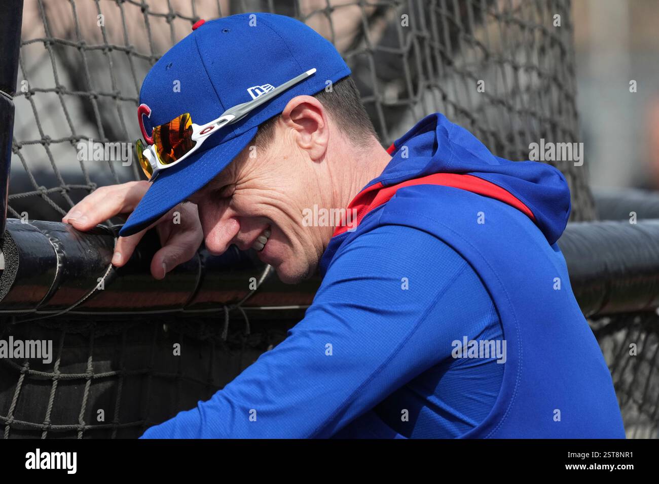 Chicago Cubs manager Craig Counsell smiles as he watches batting ...