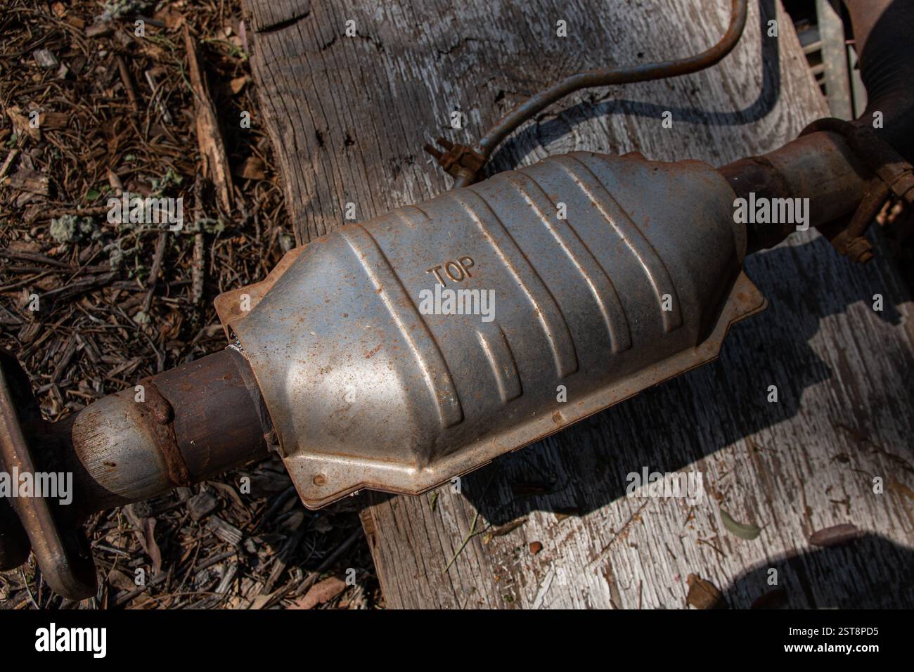 A catalytic converter removed from an automobile. The catalytic ...