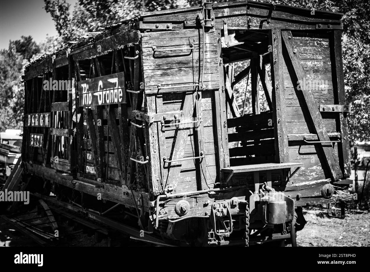 An old wooden narrow gauge railroad cattle car in need of restoration ...