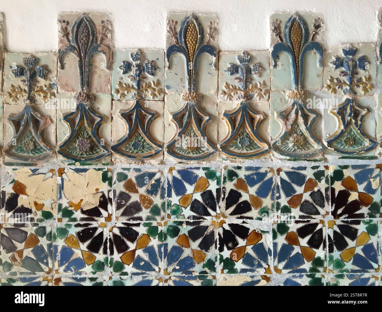 Azulejos, geometric patterns in blue, white, and yellow. Star motifs ...