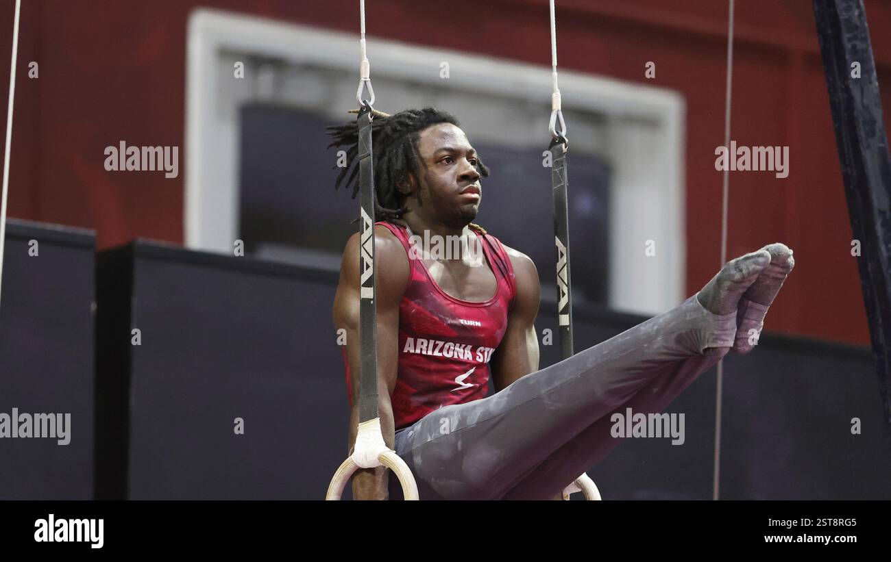 Arizona State gymnast Samuel Walker Jr. performs on the Rings during an ...