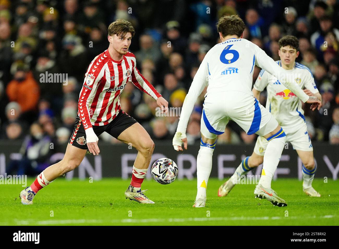 Sunderland's Dennis Cirkin (left) and Leeds United's Joe Rodon battle ...