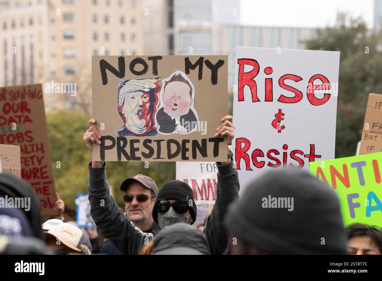 Austin, Texas USA, February 17 2025: Texans carrying homemade protest ...