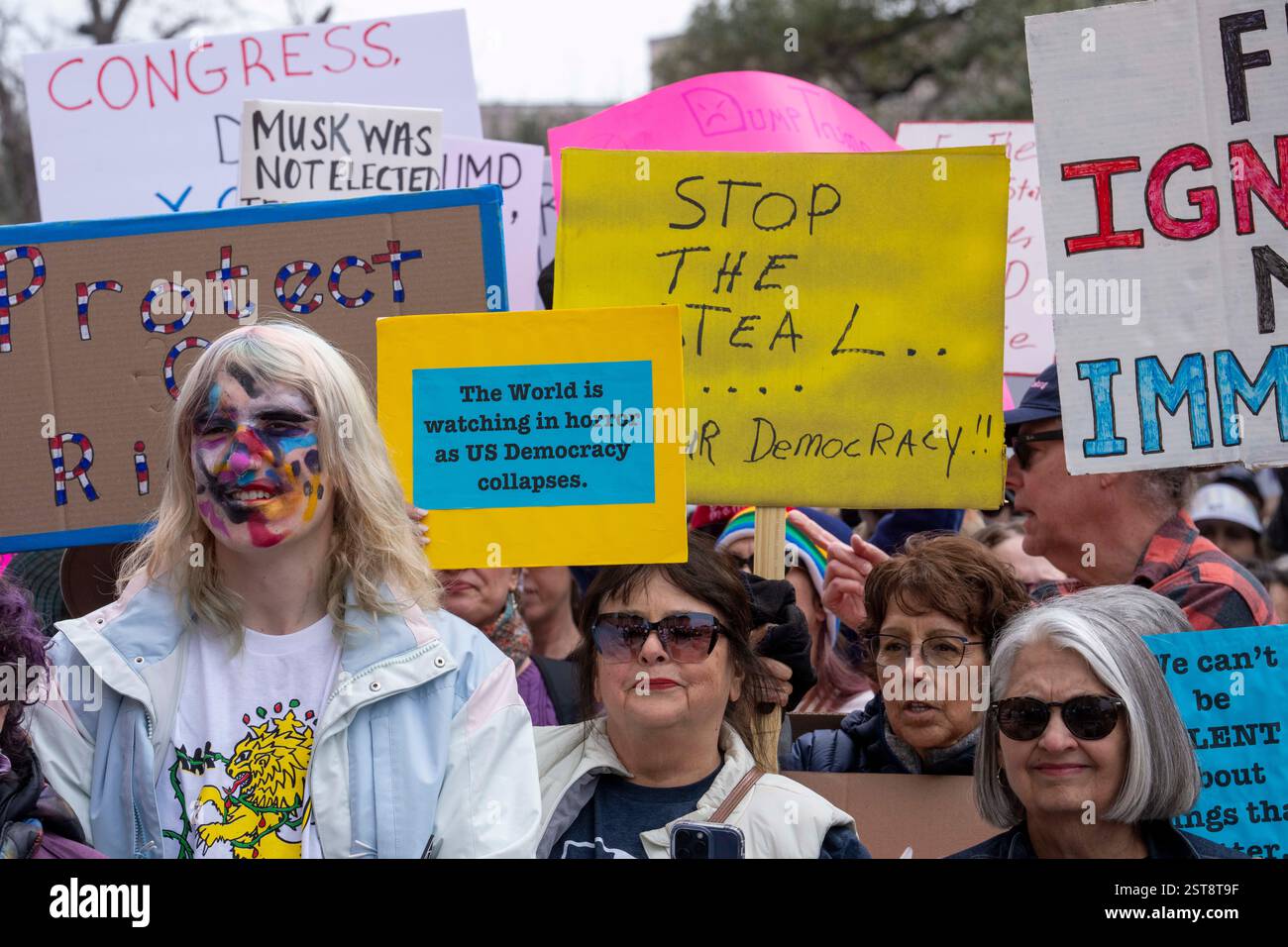 Austin, Texas USA, February 17 2025: Texans carrying homemade protest ...