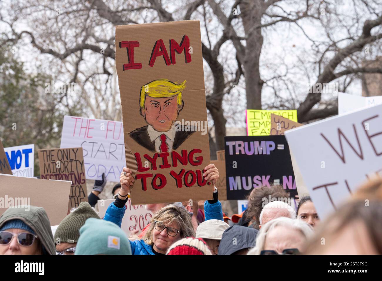 Austin, Texas USA, February 17 2025: Texans carrying homemade protest ...