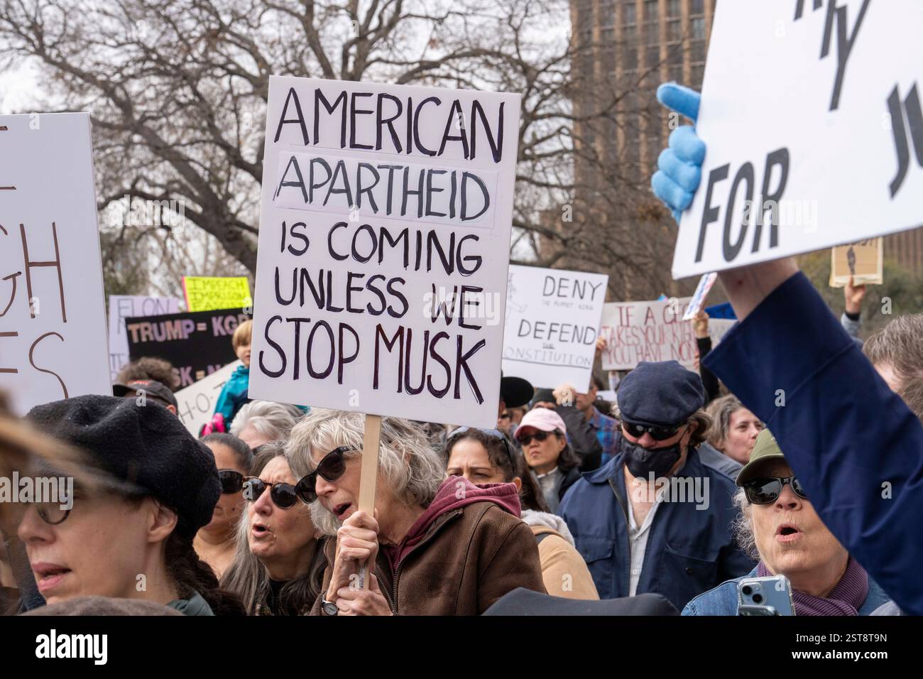 Austin, Texas USA, February 17 2025: Texans carrying homemade protest ...