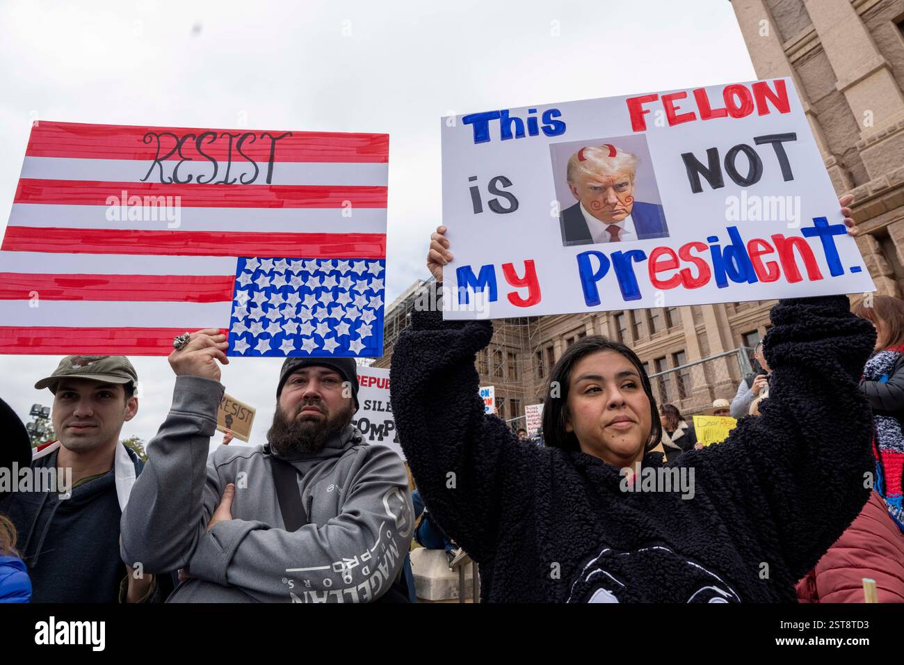 Austin, Texas USA, February 17 2025: Texans carrying homemade protest ...
