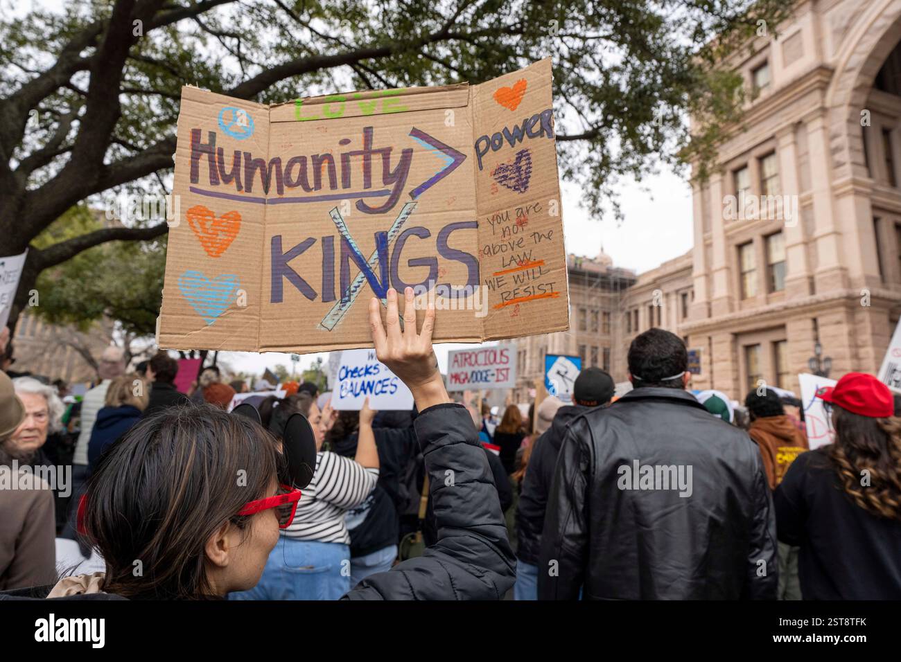 Austin, Texas USA, February 17 2025: Texans carrying homemade protest ...