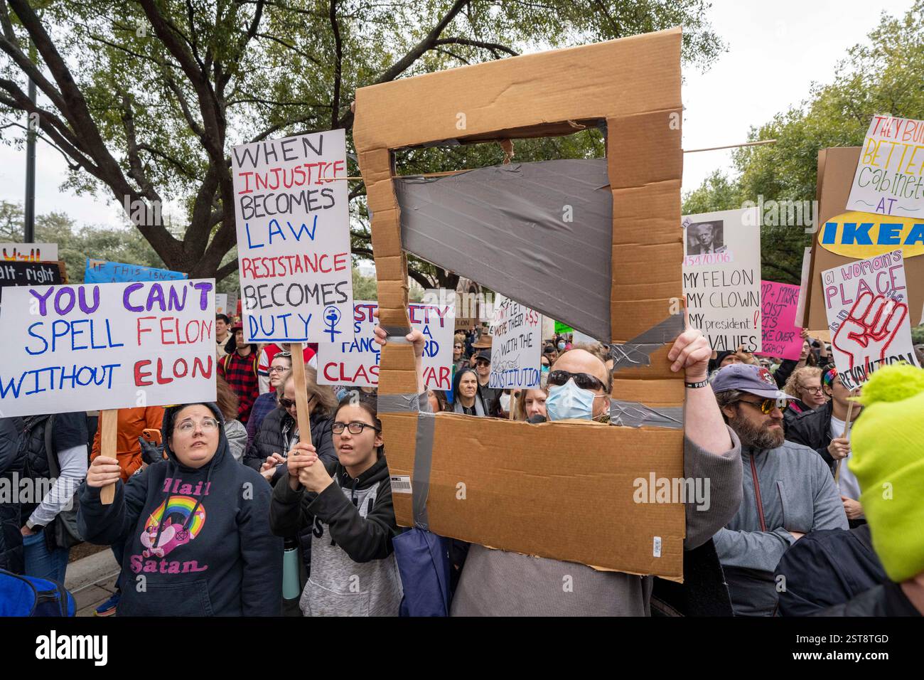 Austin, Texas USA, February 17 2025: Texans carrying homemade protest ...