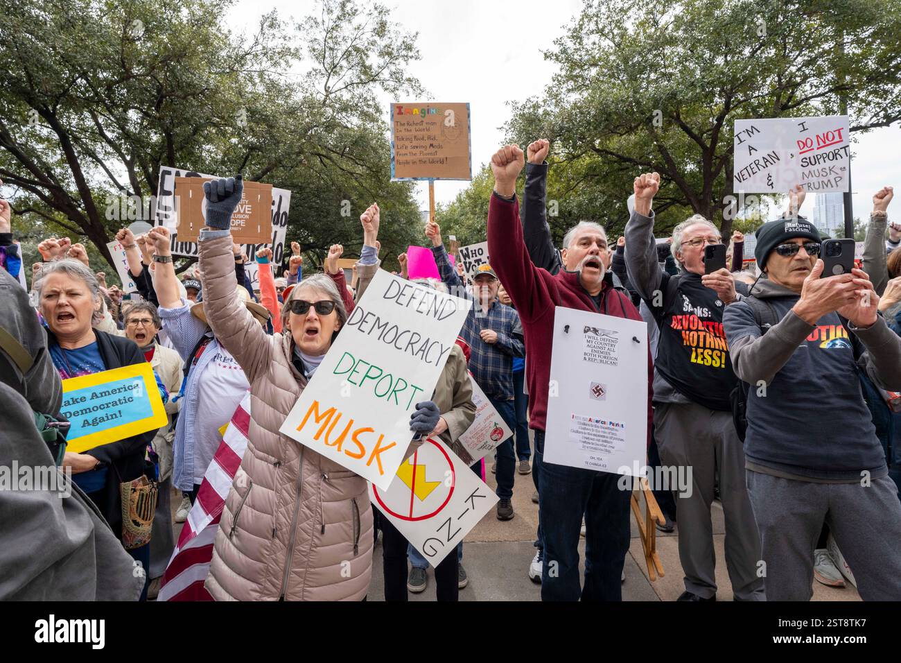 Austin, Texas USA, February 17 2025: Texans carrying homemade protest ...