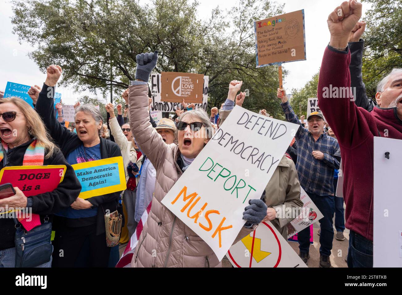 Austin, Texas USA, February 17 2025: Texans carrying homemade protest ...