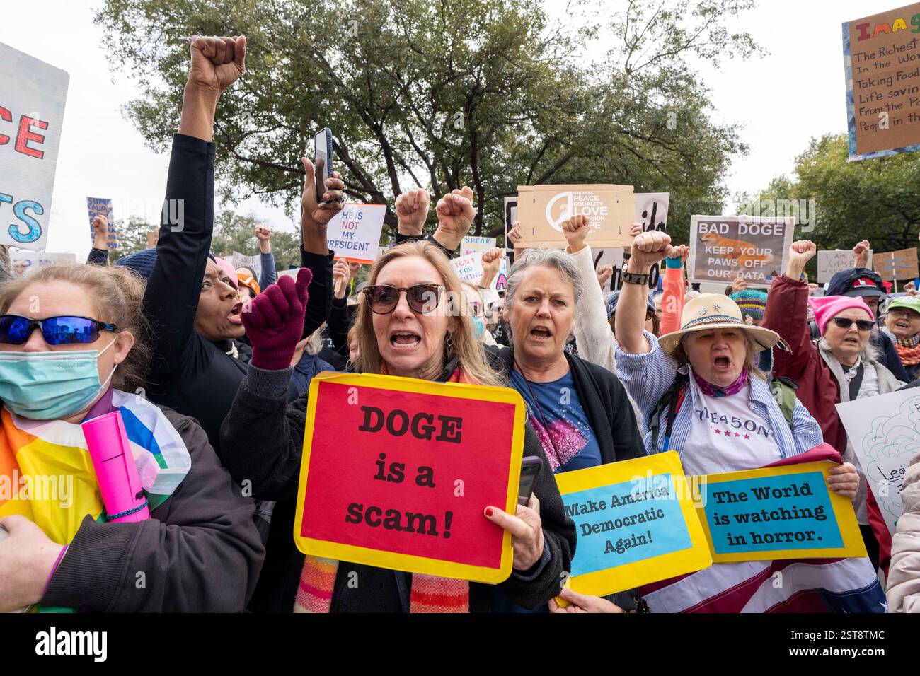 Austin, Texas USA, February 17 2025: Texans carrying homemade protest ...