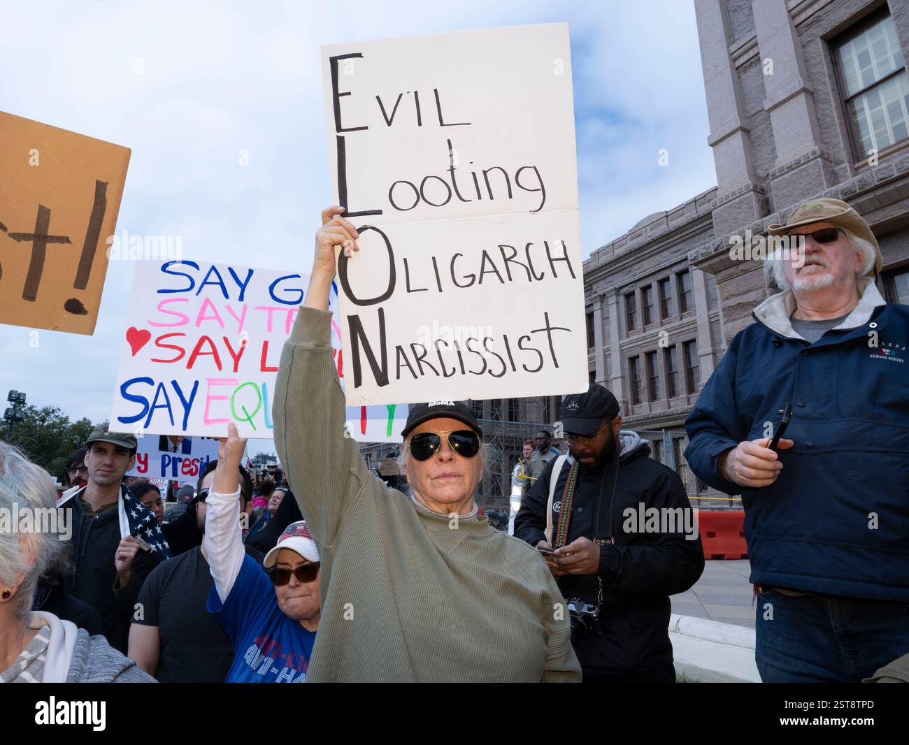 Austin, Texas USA, February 17 2025: Texans carrying homemade protest ...