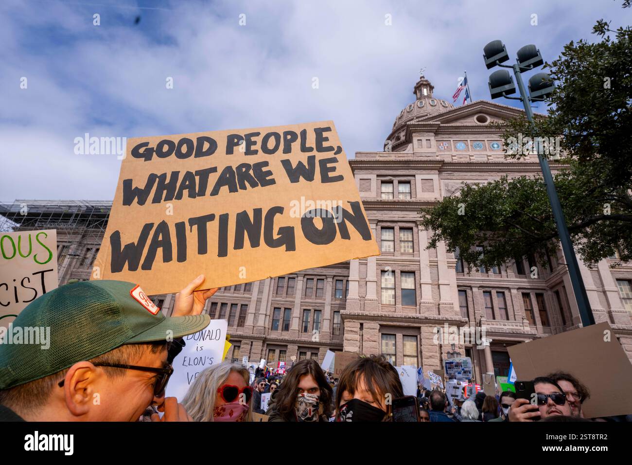 Austin, Texas USA, February 17 2025: Texans carrying homemade protest ...