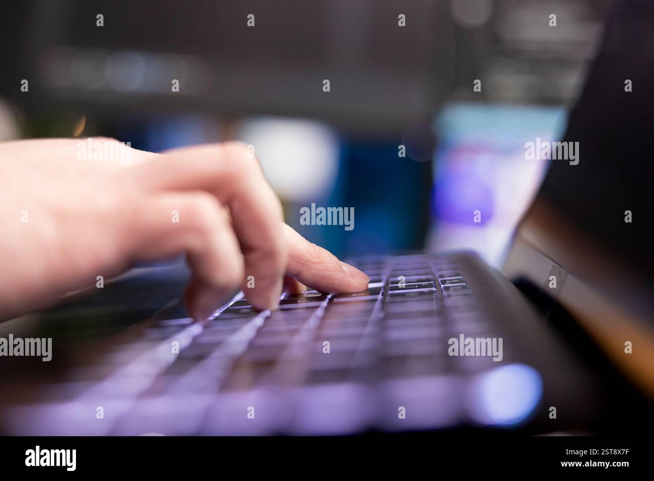 Programmer typing on keyboard, designing and developing software programs, extreme close up shot ...