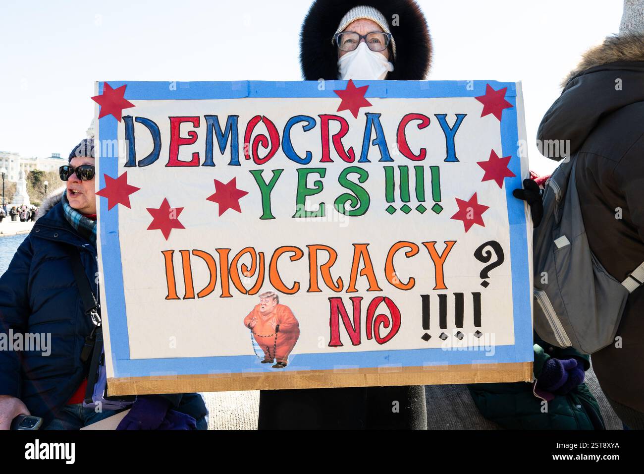 Washington, United States. 17th Feb, 2025. Person carrying a sign ...