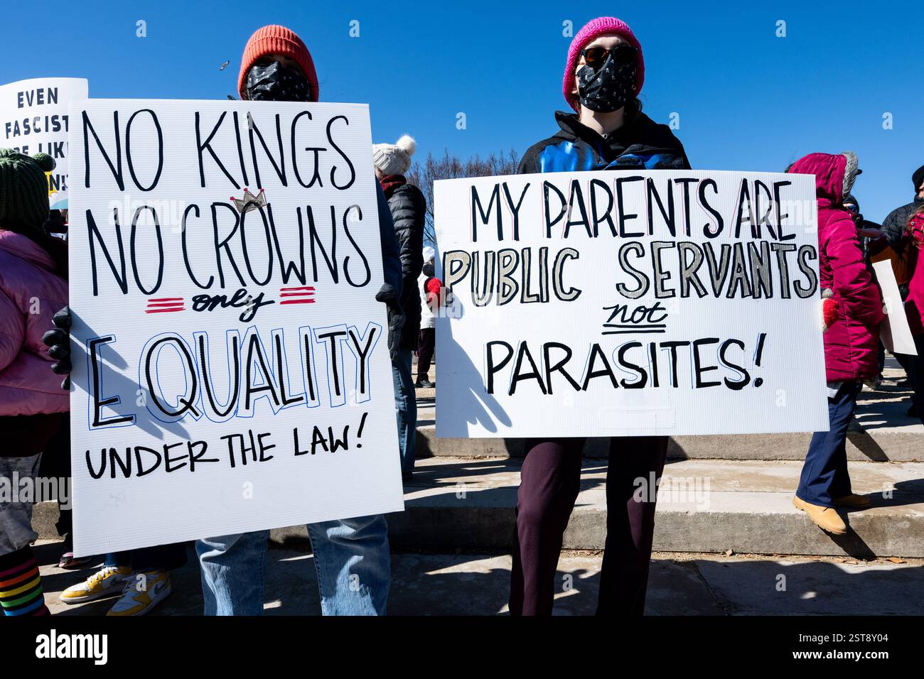 Washington, United States. 17th Feb, 2025. People carrting signs saying ...