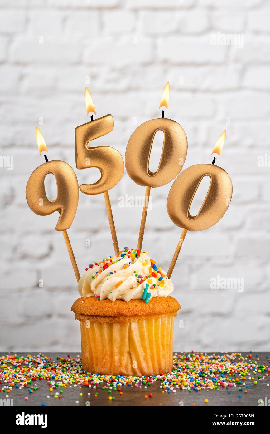 Number of followers or likes - Candle number 9500 Stock Photo - Alamy