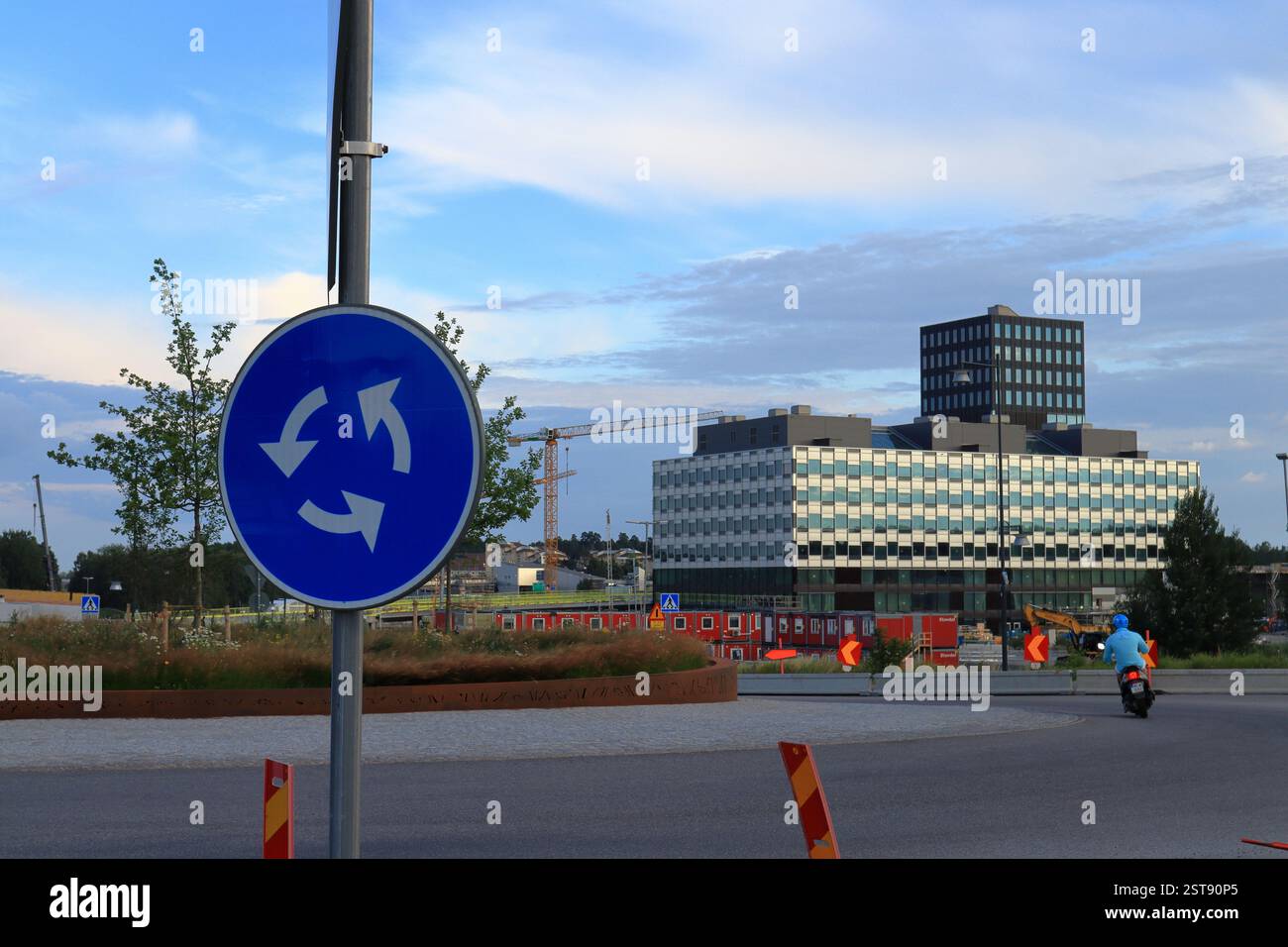 Swedish traffic sign for a roundabout. Urban city life. Traffic circle ...