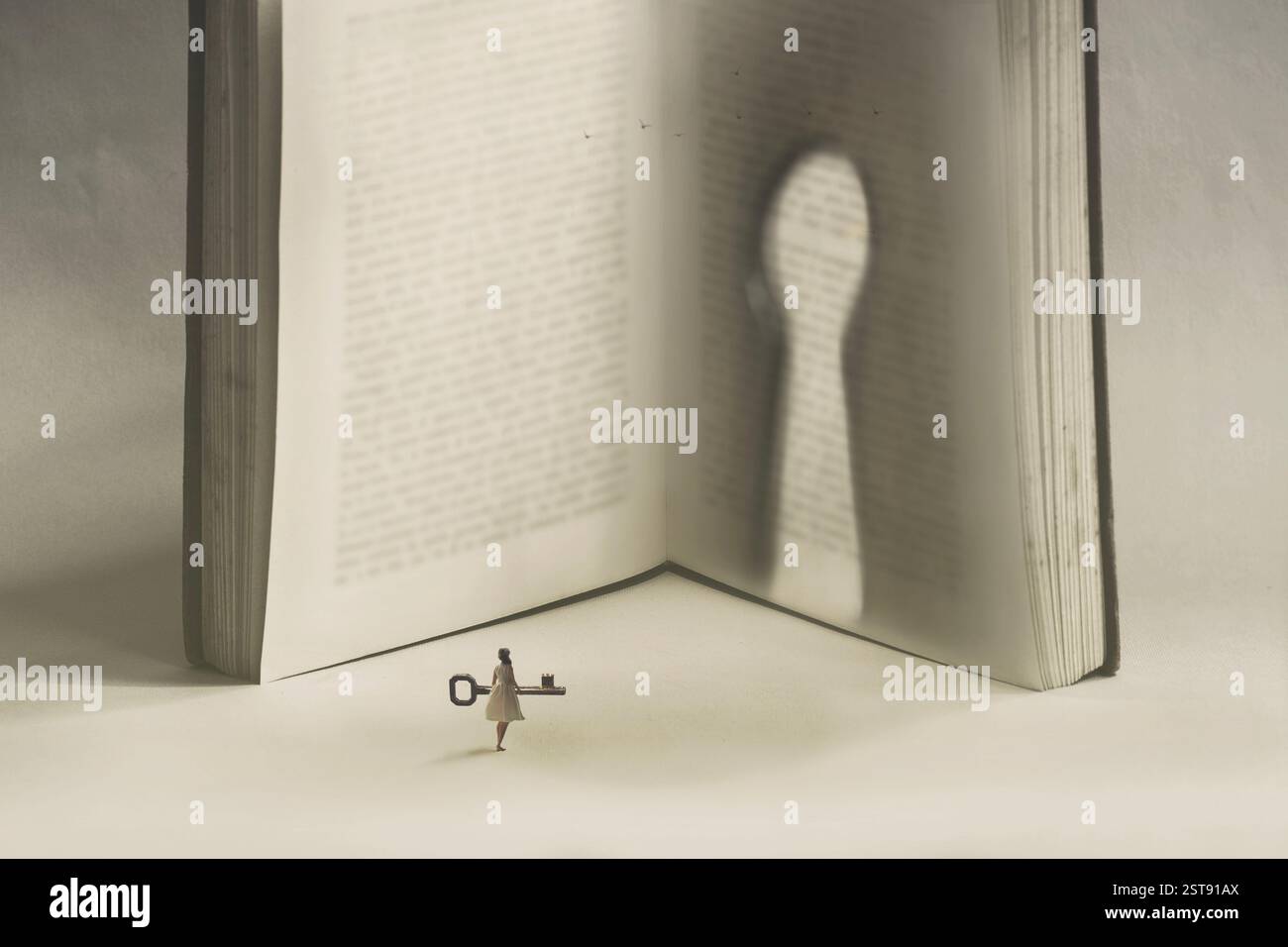 A woman carries the key to an open book, revealing the secret hidden in ...