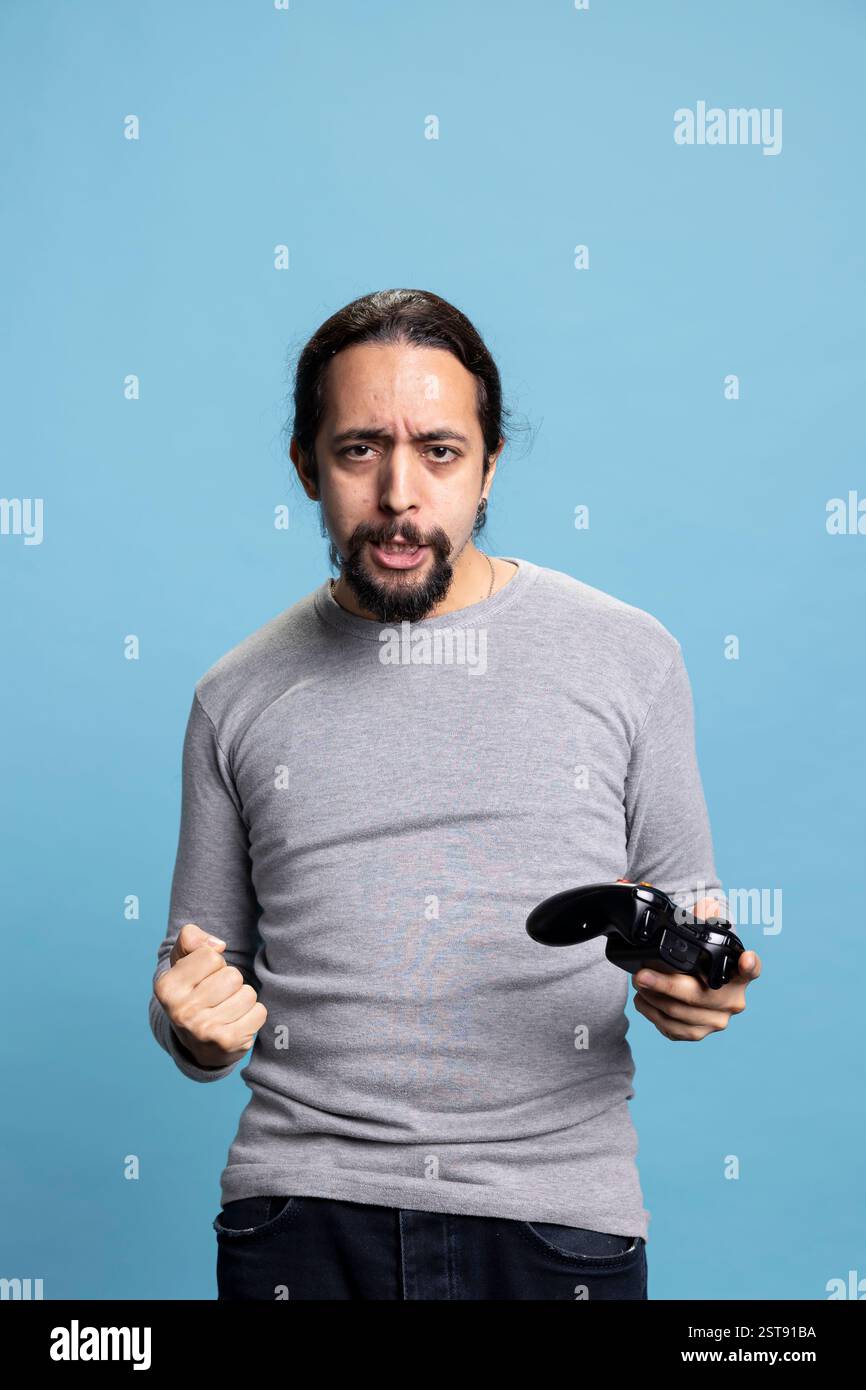 Cool satisfied person playing video games and winning e sport ...