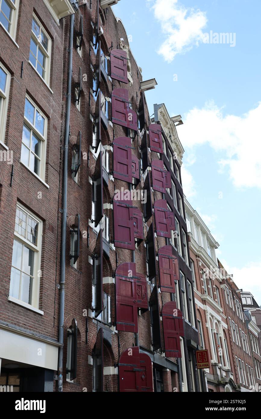 Amsterdam shuttered windows Stock Photo - Alamy