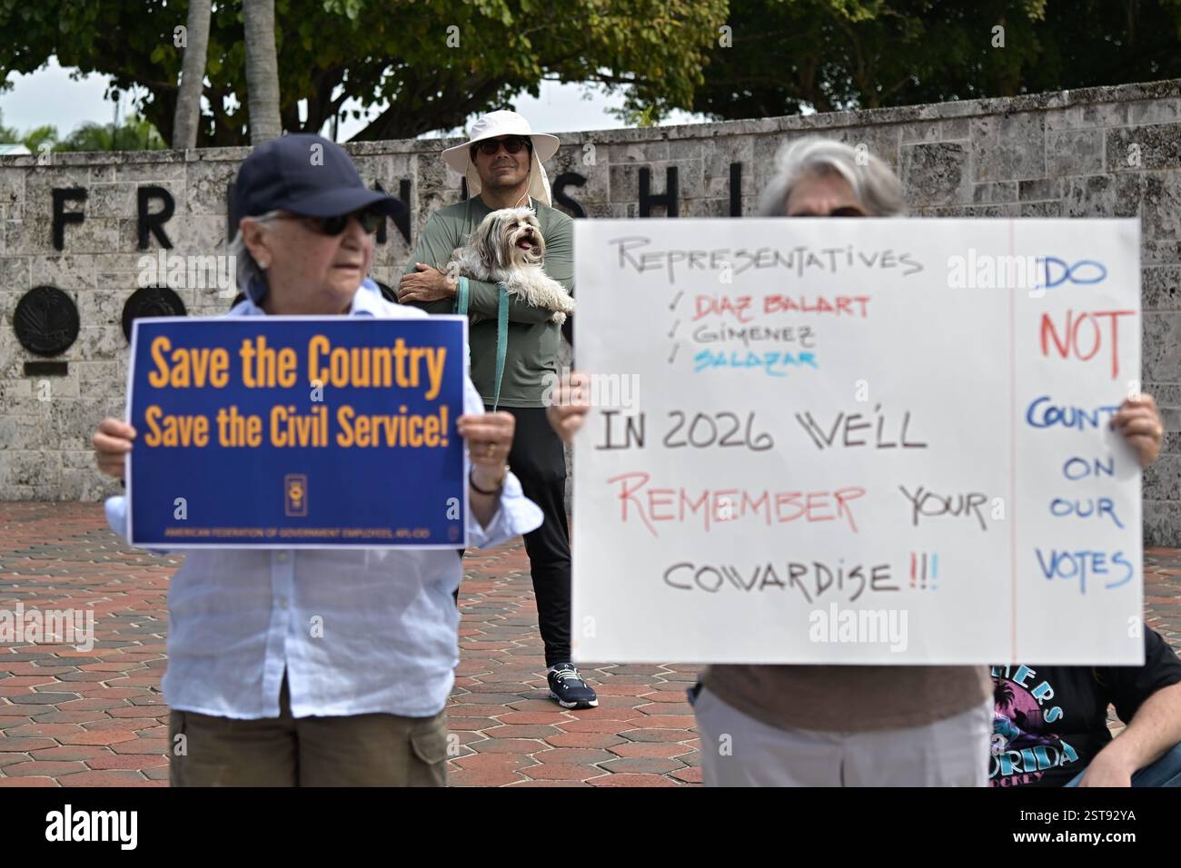 Miami, USA. 17th Feb, 2025. People protest against US President Donald ...