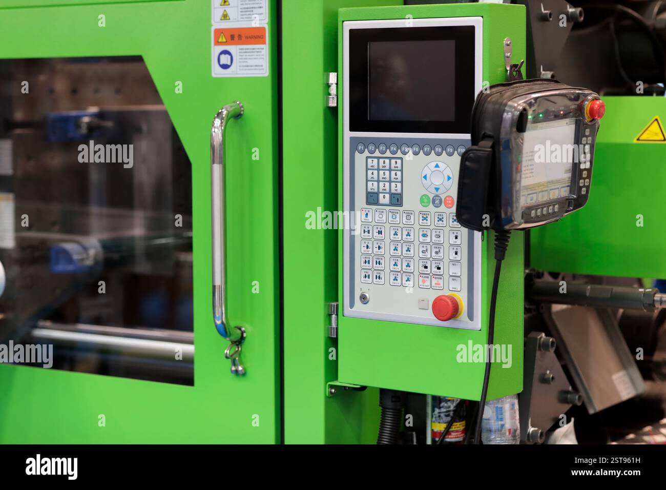 Control panel of plastic injection molding machine close up. Selective ...