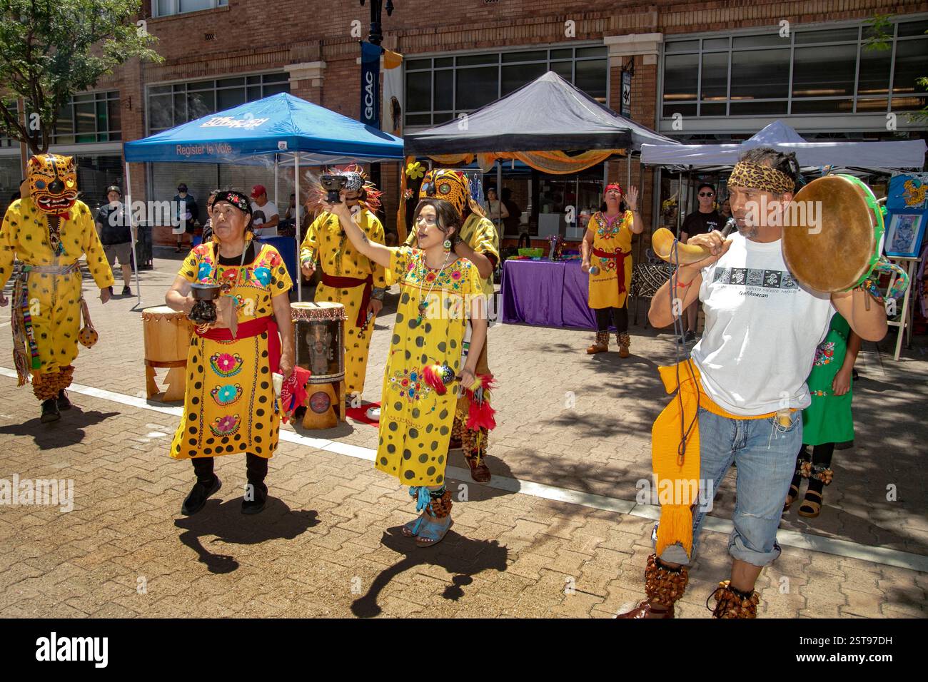A group of Hispanic dancers perform in Santa Ana, CA, celebrating ...