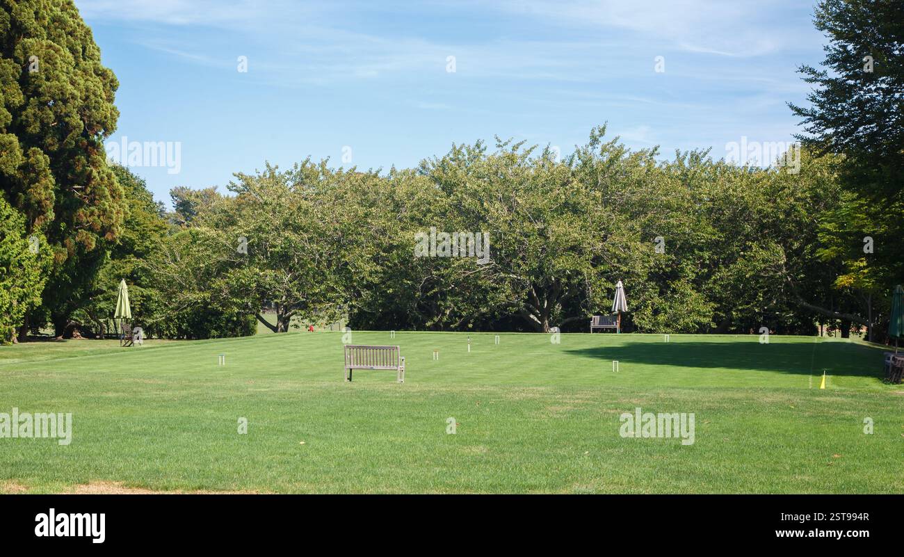 Cricket game on the grass at Chateau-sur-Mer gilded age historic ...