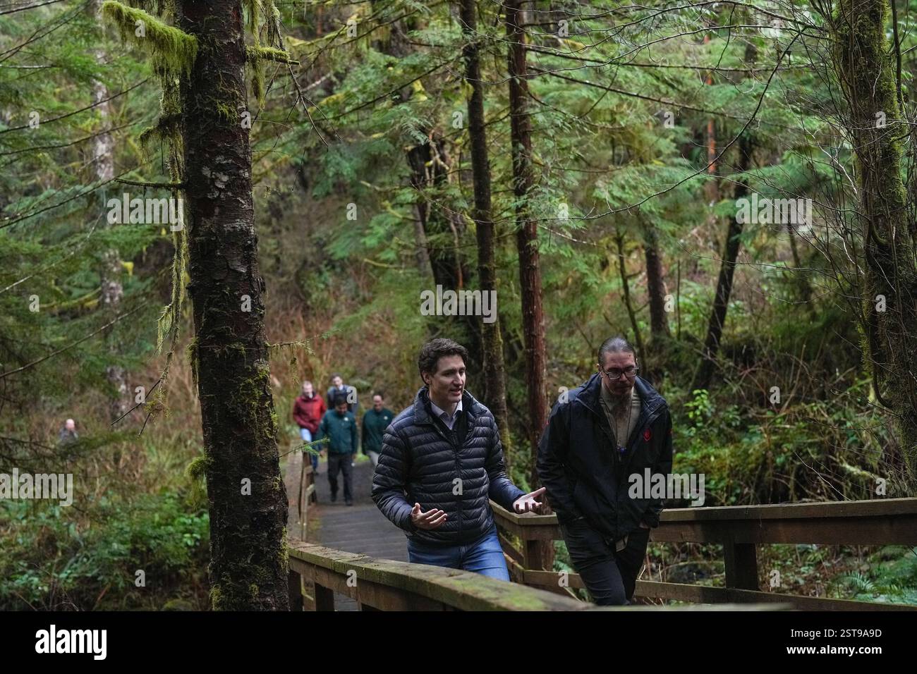 Prime Minister Justin Trudeau, front left, and Haida Nation President ...