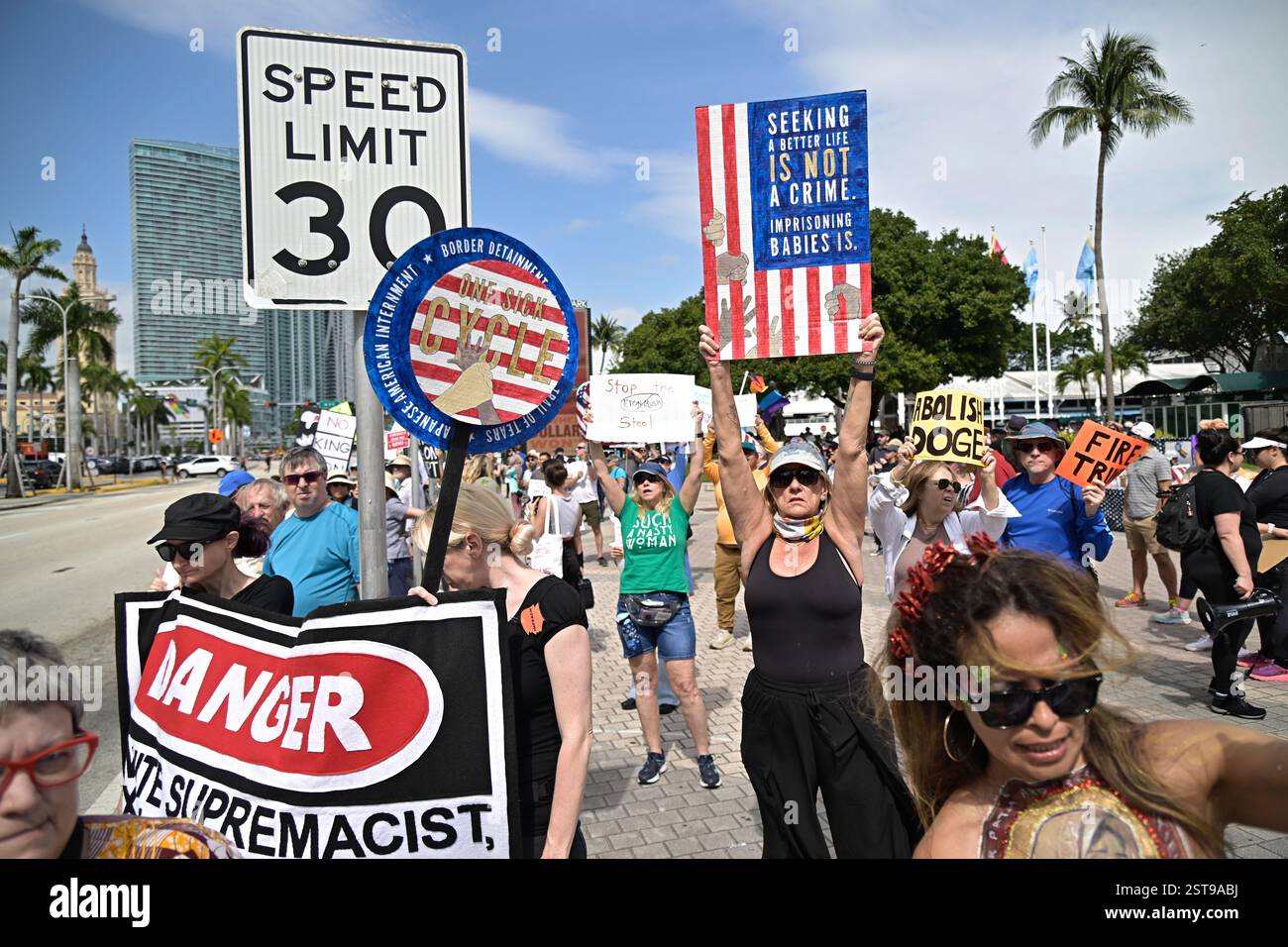 Miami, USA. 17th Feb, 2025. People protest against US President Donald ...