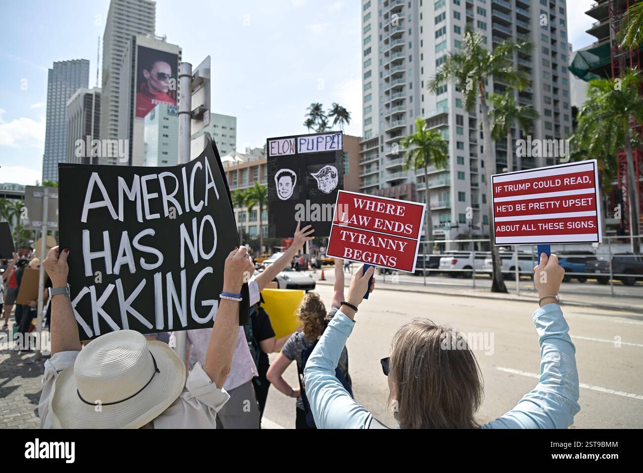 Miami, USA. 17th Feb, 2025. People protest against US President Donald ...