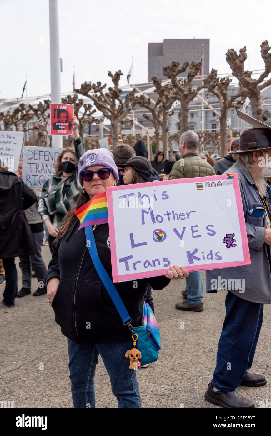 San Francisco, Calif., USA, 17th Feb, 2025. A woman holds a sign ...