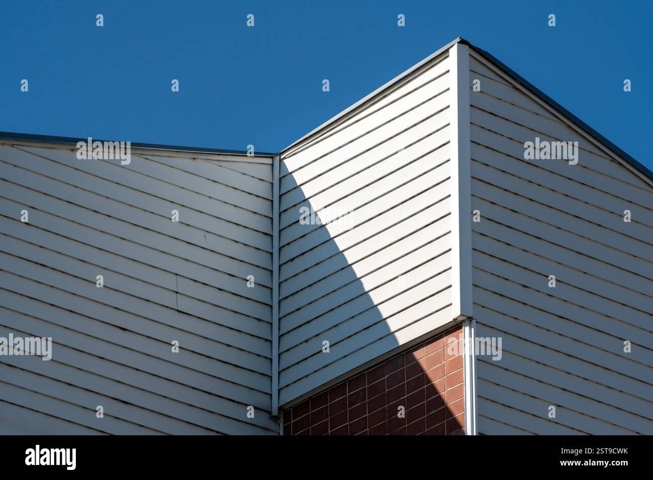 Geometric Rooftop Shadows, under clear blue sky Stock Photo - Alamy