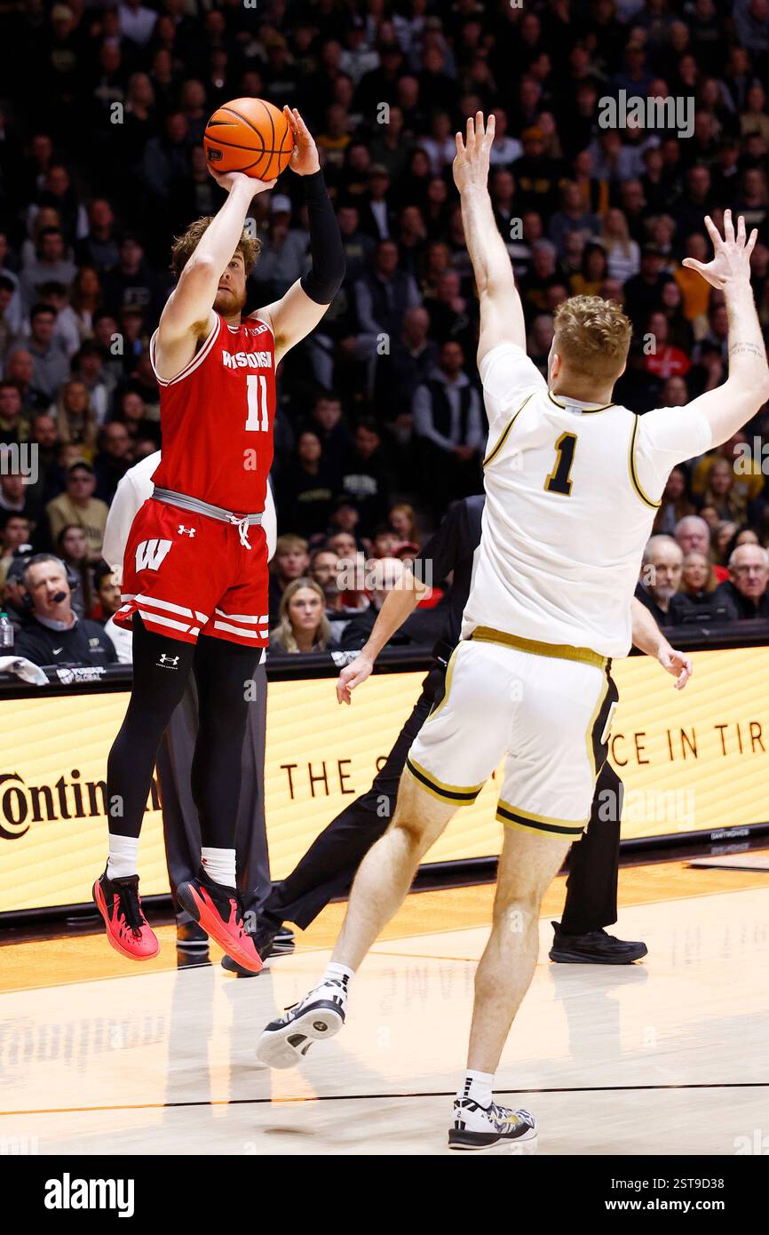 WEST LAFAYETTE, IN - FEBRUARY 15: Wisconsin Badgers guard Max Klesmit (11) fires up his jump ...