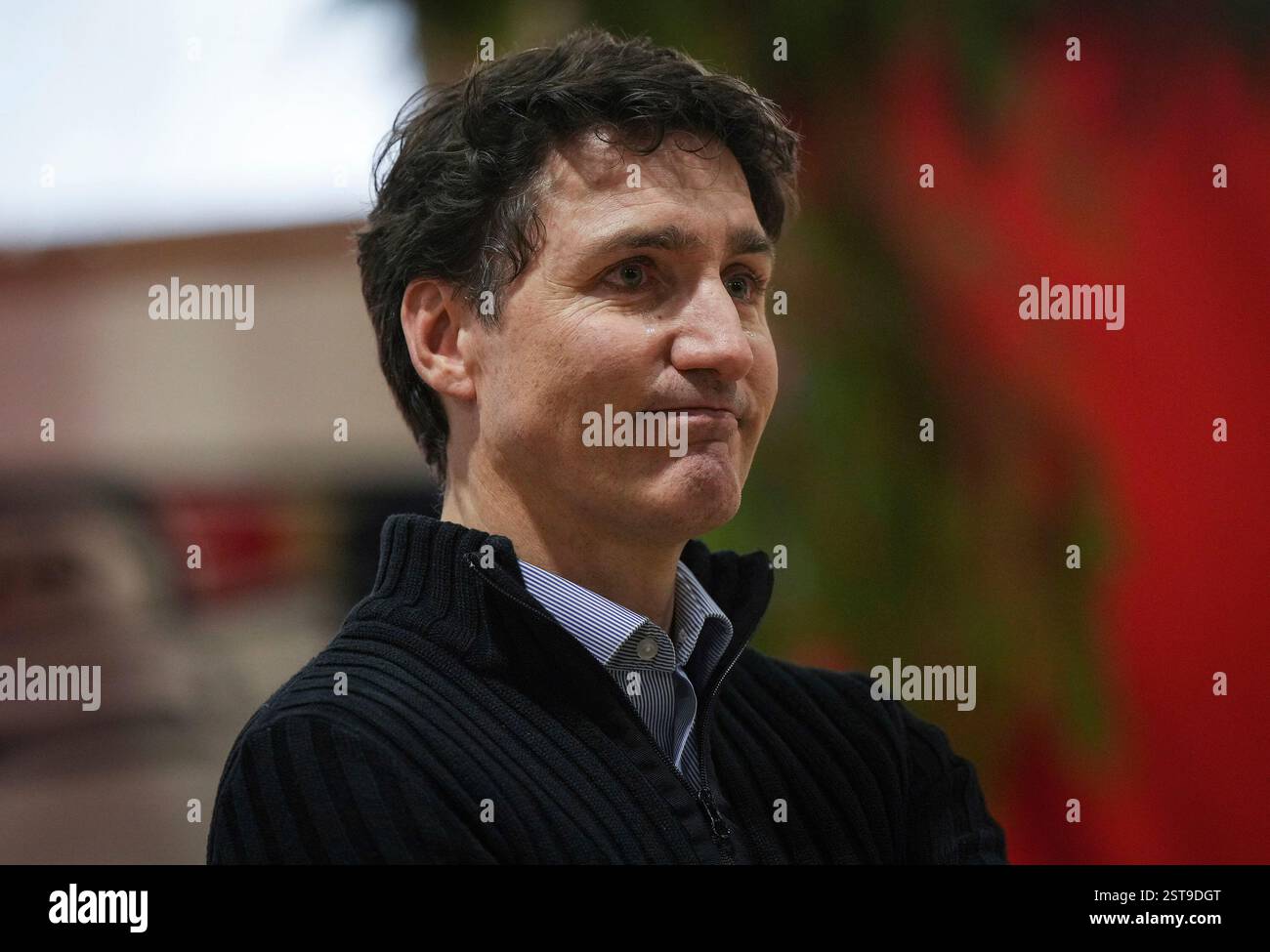 Tears run down Canada's Prime Minister Justin Trudeau's face as he ...