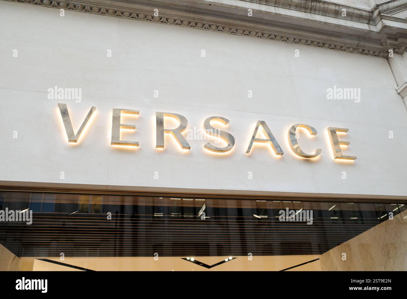 London, UK. 17th Feb, 2025. Versace brand signage is seen on New Bond ...