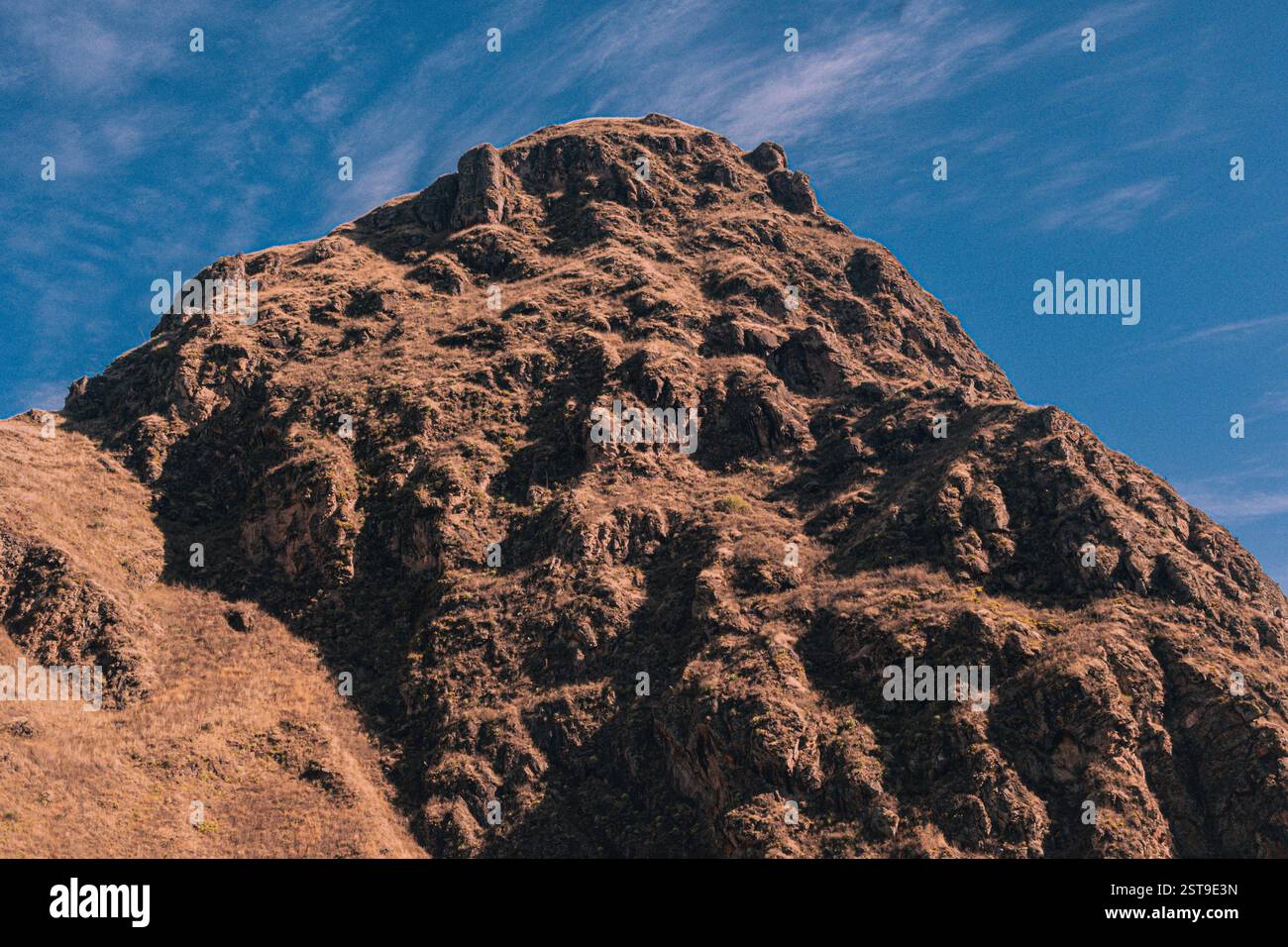 Golden hour over the majestic mountains of Sorata, Bolivia. The warm ...