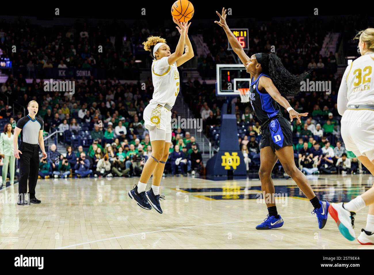 Notre Dame guard Hannah Hidalgo (3) shoots as Duke guard Oluchi Okananwa, right, defends during ...