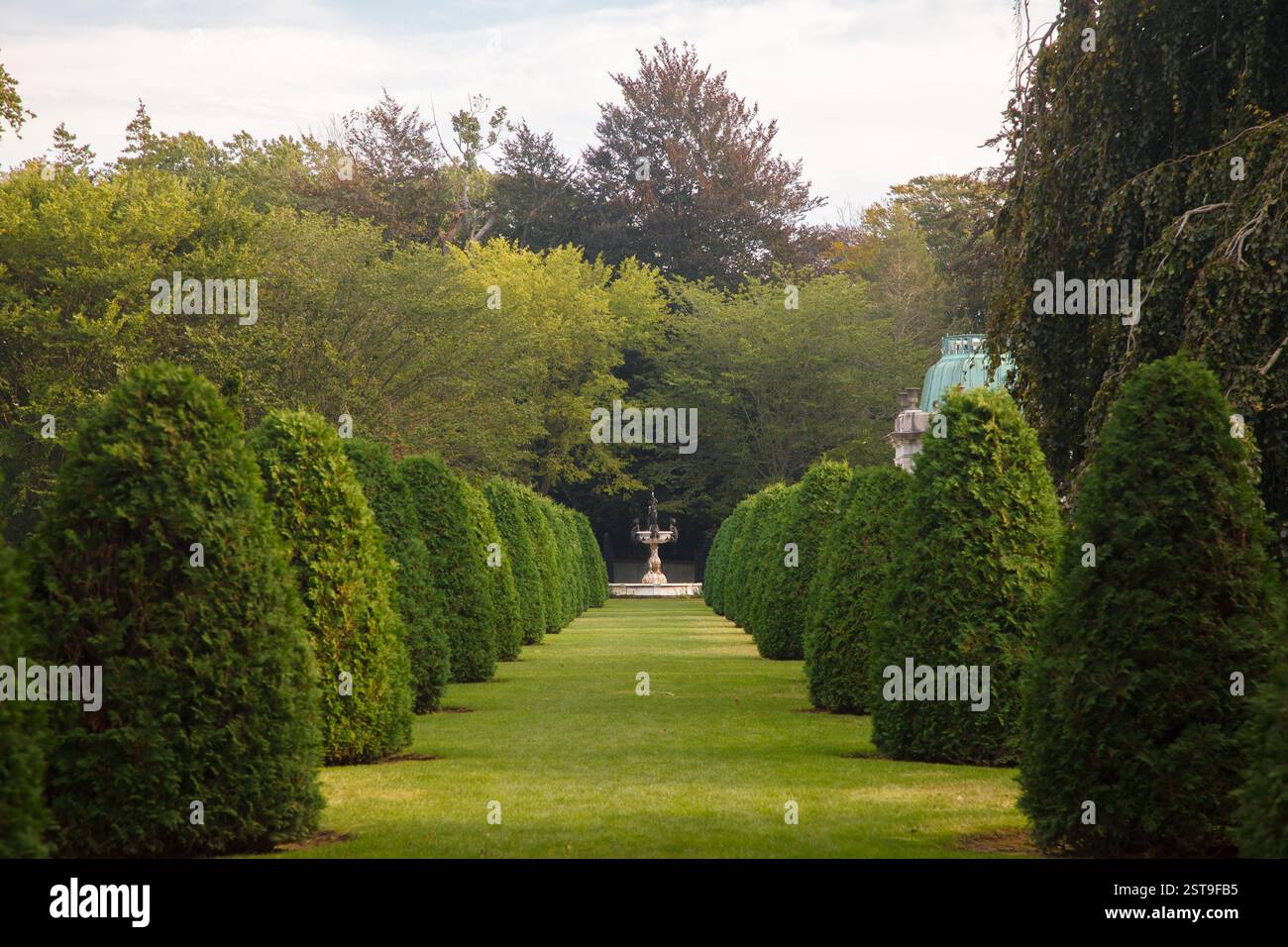 A Fountain and bushes at the beautiful the Elms gilded age historic ...
