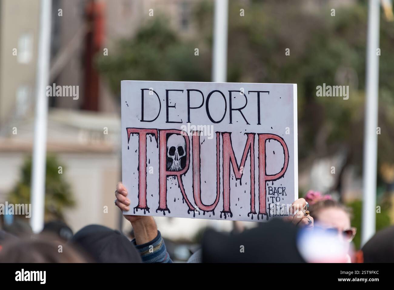 San Francisco, Calif., USA, 17th Feb, 2025. A protester holds a sign ...
