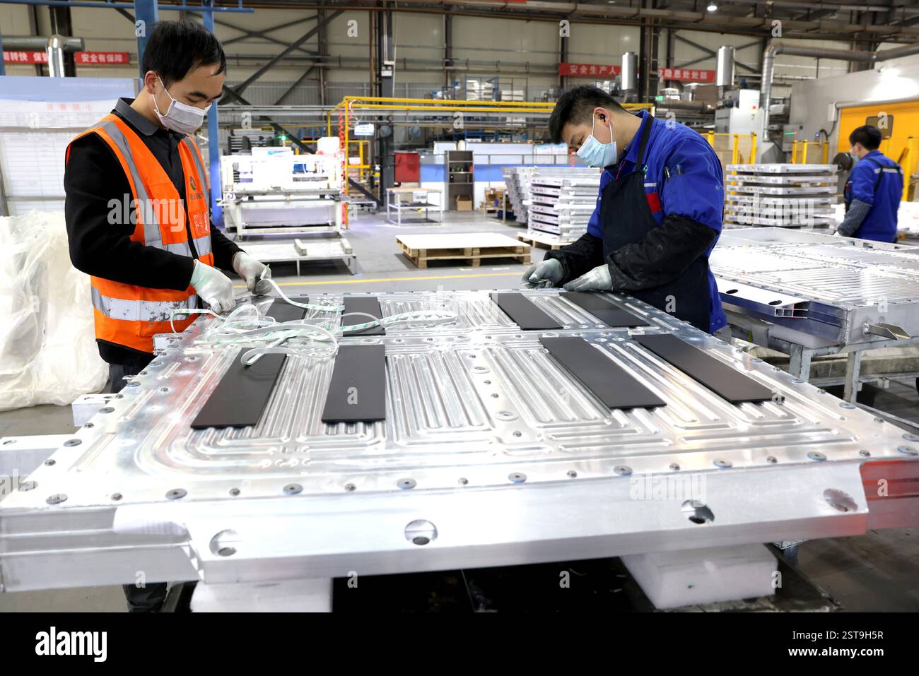 NINGDE, CHINA - FEBRUARY 17, 2025 - A worker in the production workshop ...