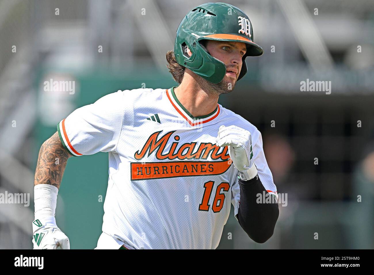 CORAL GABLES, FL - FEBRUARY 16: Miami outfielder Bobby Marsh (16) runs ...