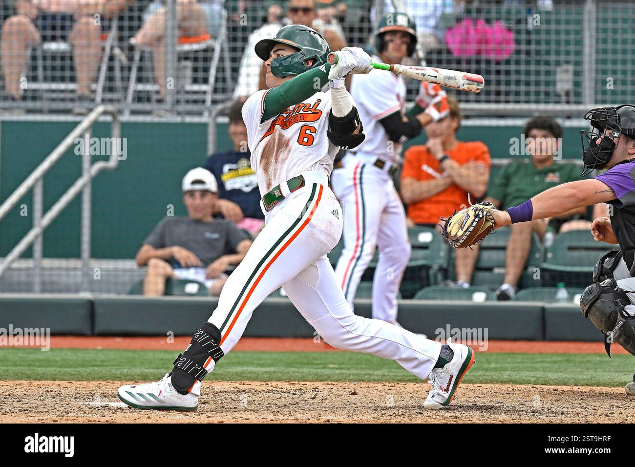 CORAL GABLES, FL - FEBRUARY 16: Miami infielder Brandon DeGoti (6) bats ...